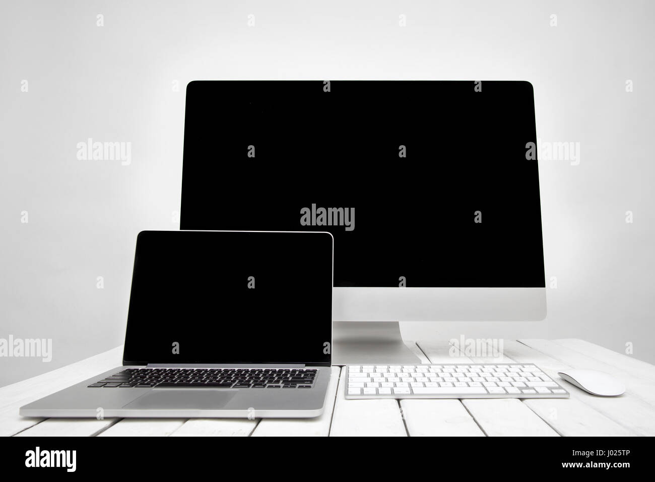 Close up view at computer and laptop Stock Photo - Alamy