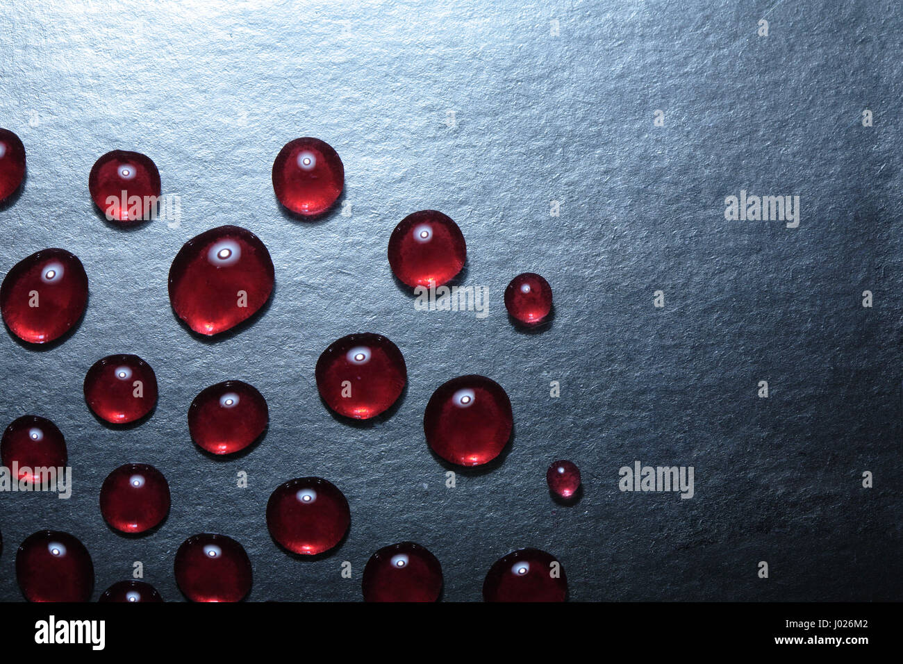 Set of red drops on dark background with free space for text Stock ...