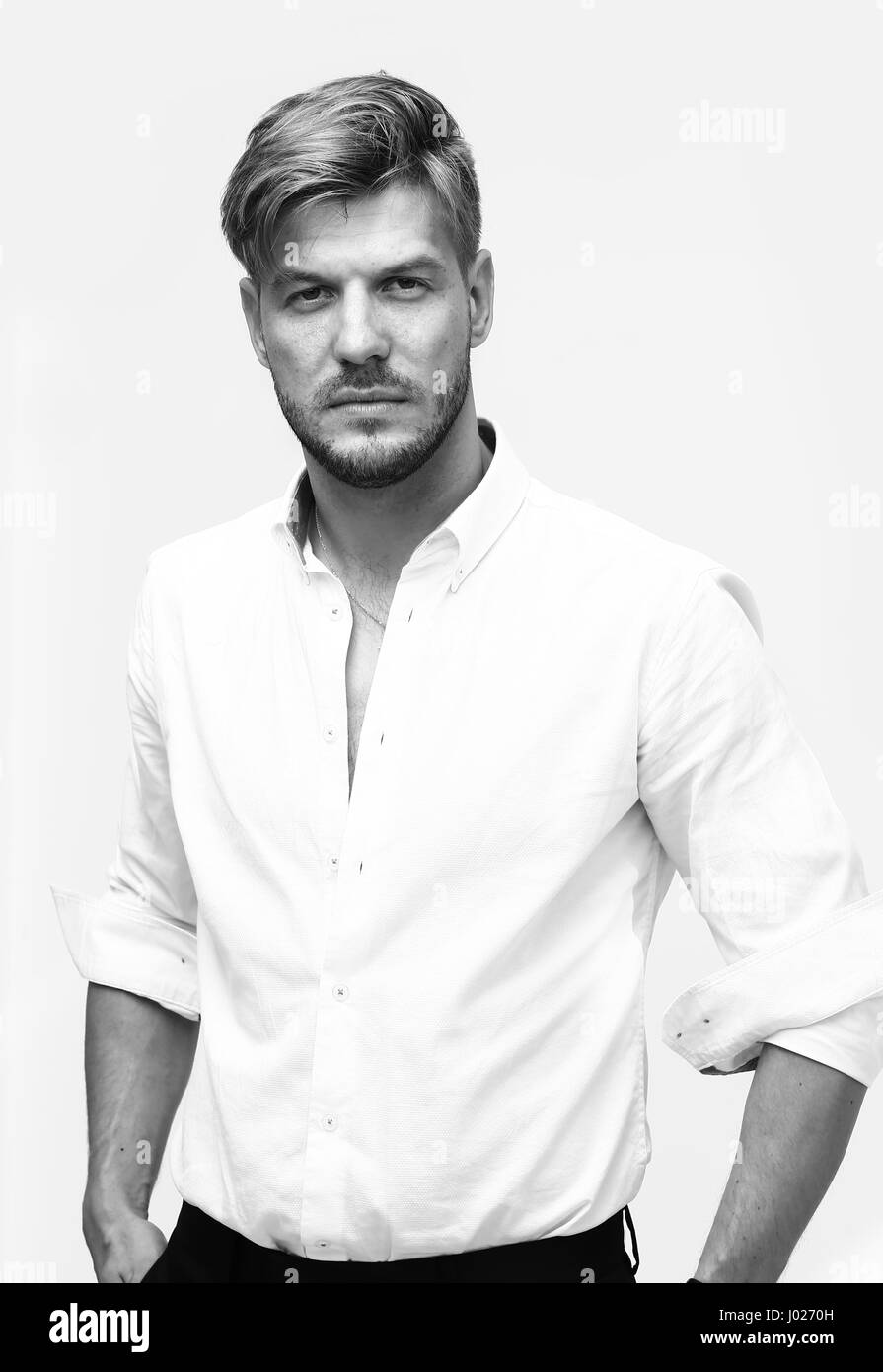 Handsome successful businessman looking Black and White Stock Photos ...