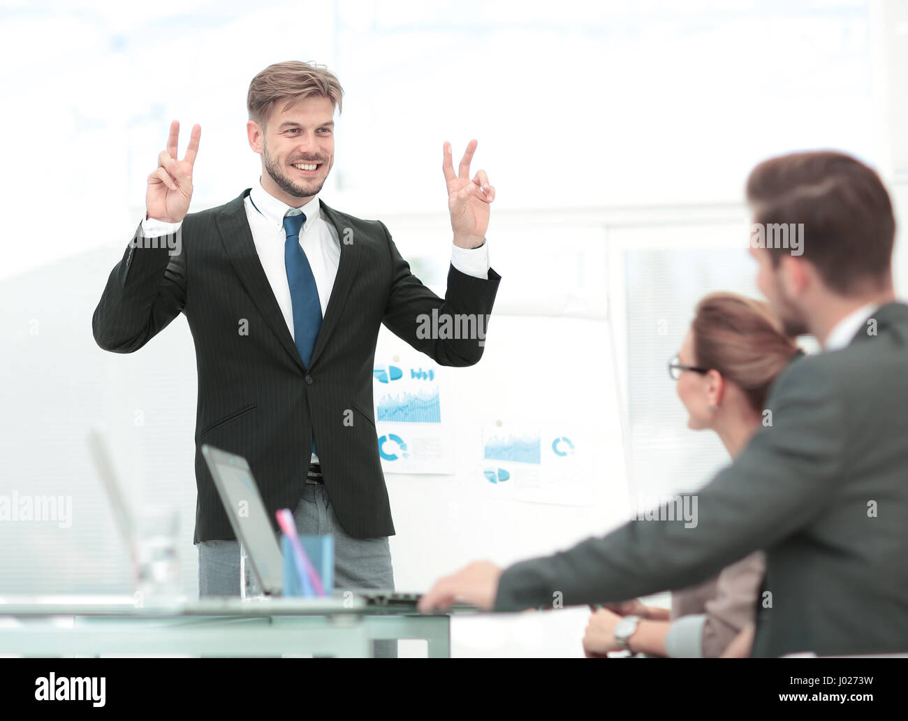 Business man asking question during his colleagues presentation Stock ...