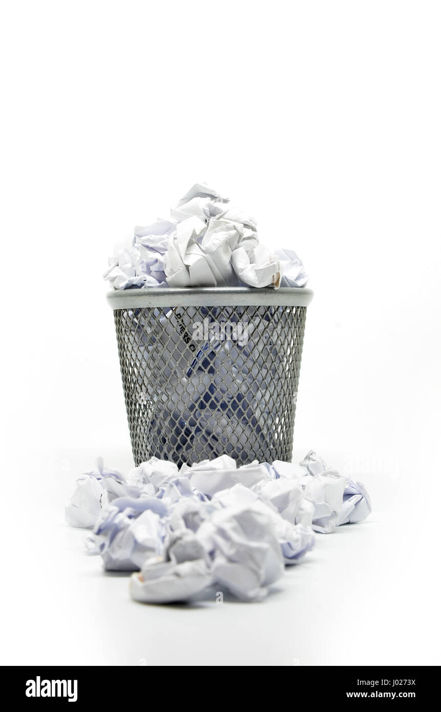 Garbage bin with paper waste isolated on white Stock Photo - Alamy
