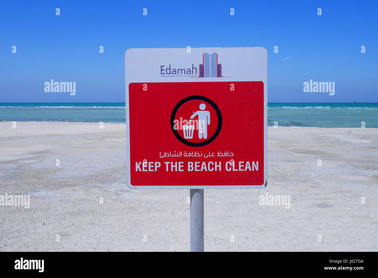Sign in English and Arabic: Keep the beach clean, Al Jazayer Beach ...