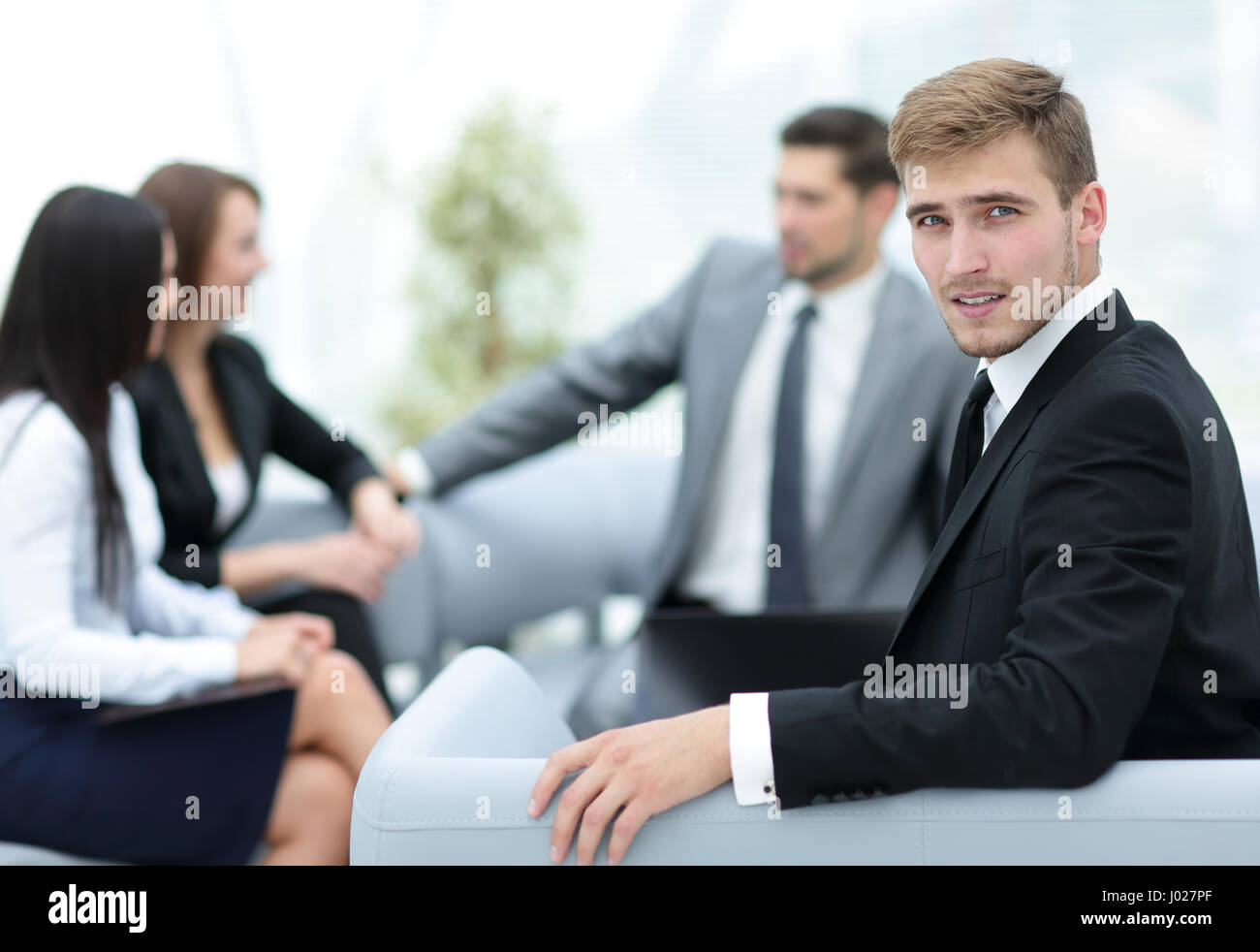 Business people working around table in modern office Stock Photo - Alamy