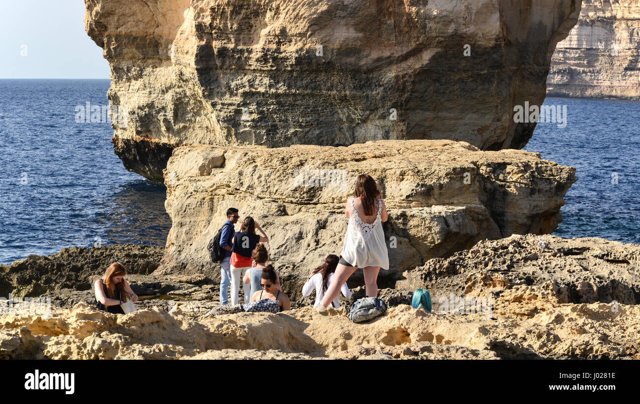 Detail of Azure Window Natural Rock Arch with tourists - Malta Stock ...
