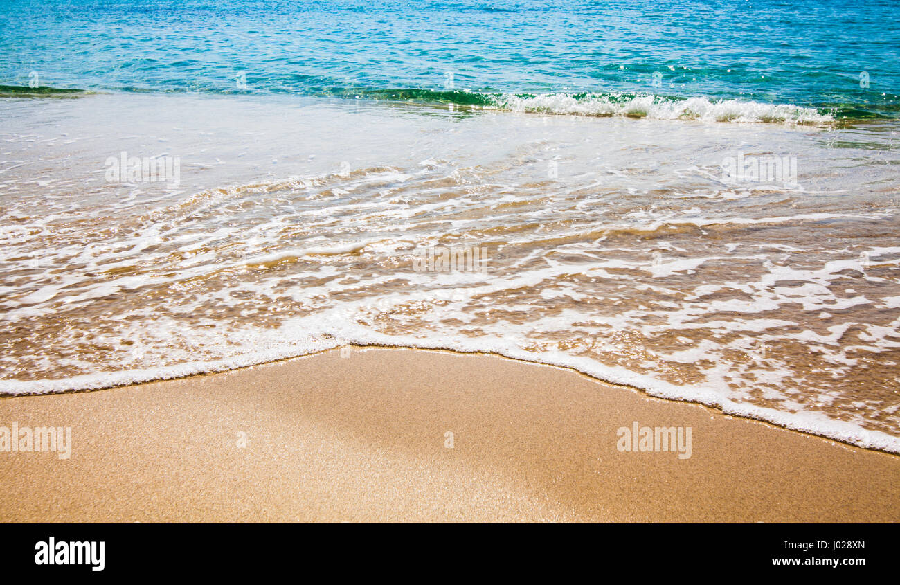 Sand beach and wave Stock Photo - Alamy