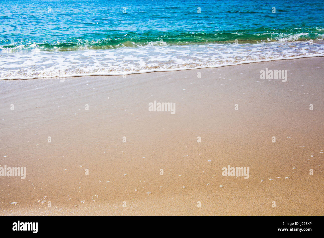Sand beach and wave Stock Photo - Alamy