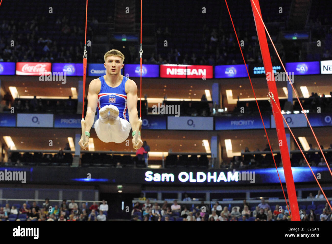 Sam oldham competing on the rings hi-res stock photography and images ...