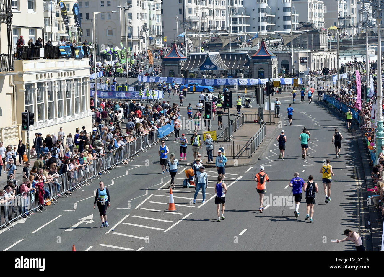 Brighton Marathon runners on the seafront 2017 UK Stock Photo - Alamy