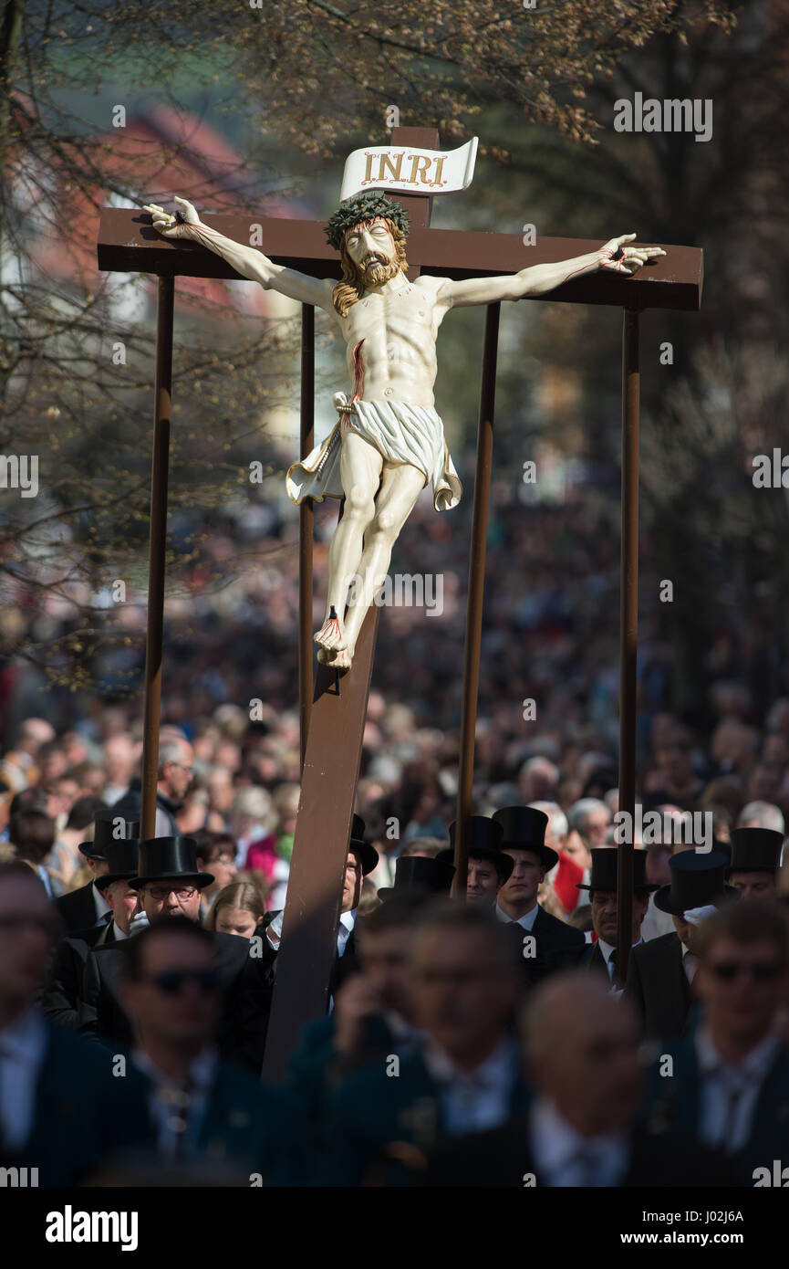 Catholic believers holding up life-size depictions representing the ...