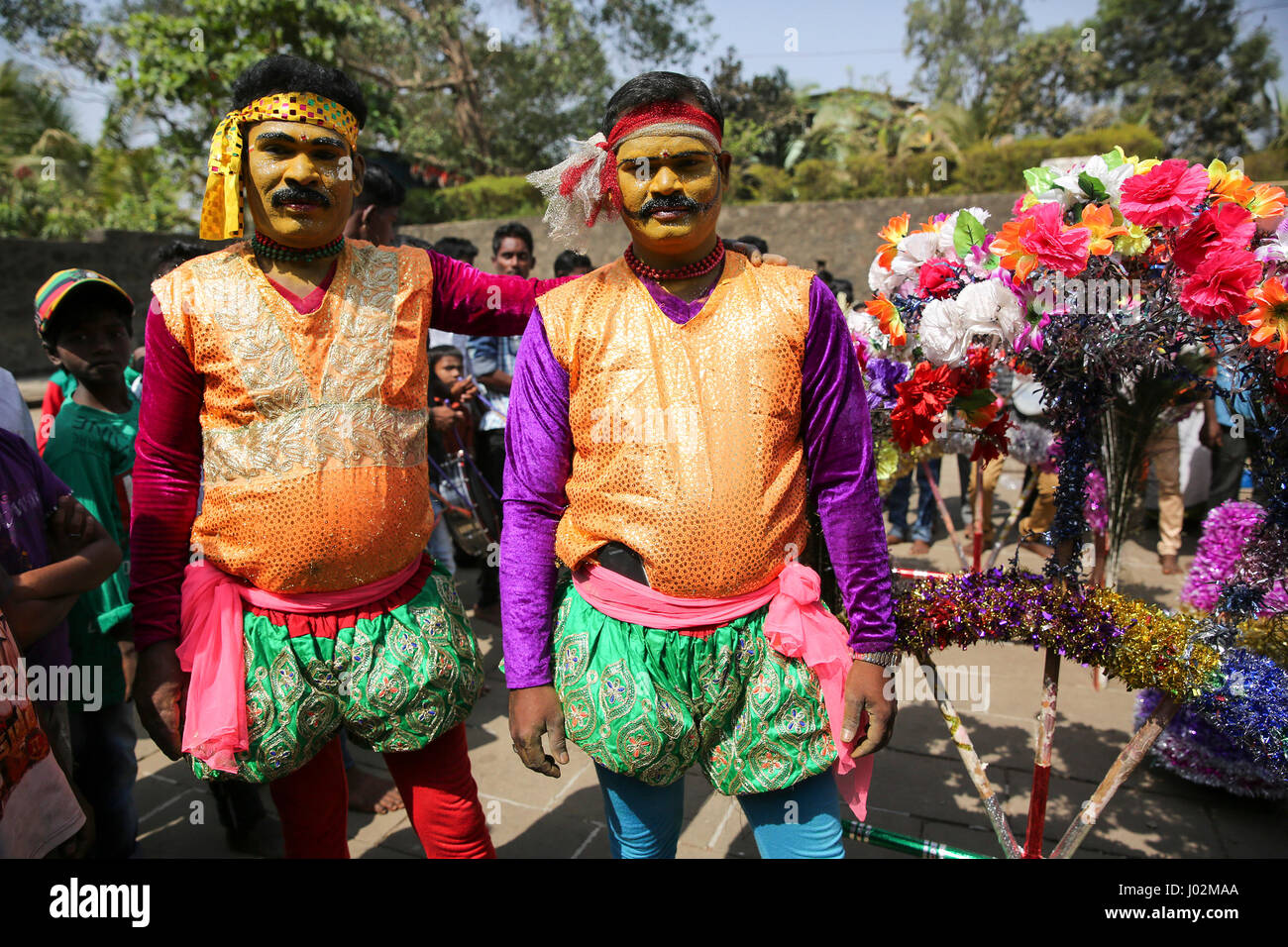 Maharashtra, India. 9th Apr, 2017. Ritual dancers pose for pictures ...