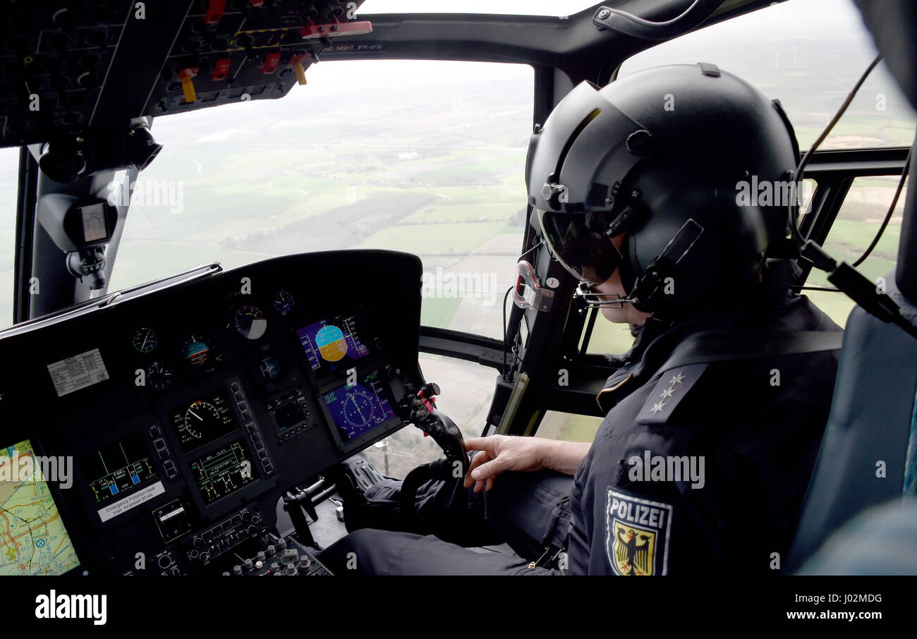 A federal police pilot in a helicopter near Flensburg, Germany, 5 April ...