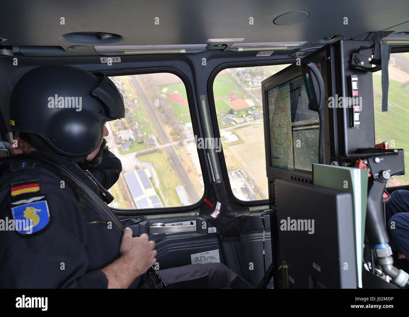 A federal police pilot in a helicopter near Flensburg, Germany, 5 April ...