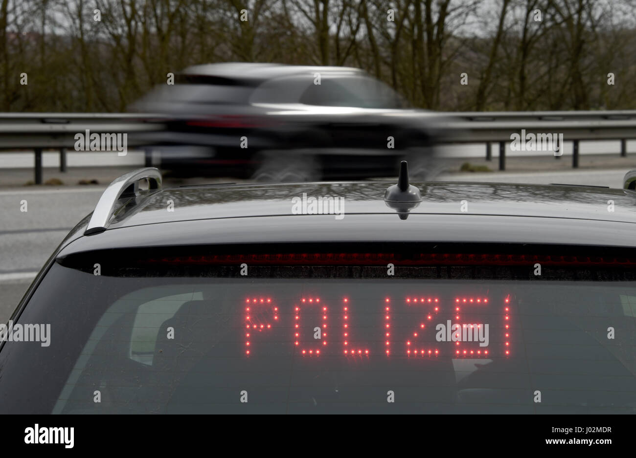 A digital display with the word 'Police' in German in the back of an ...