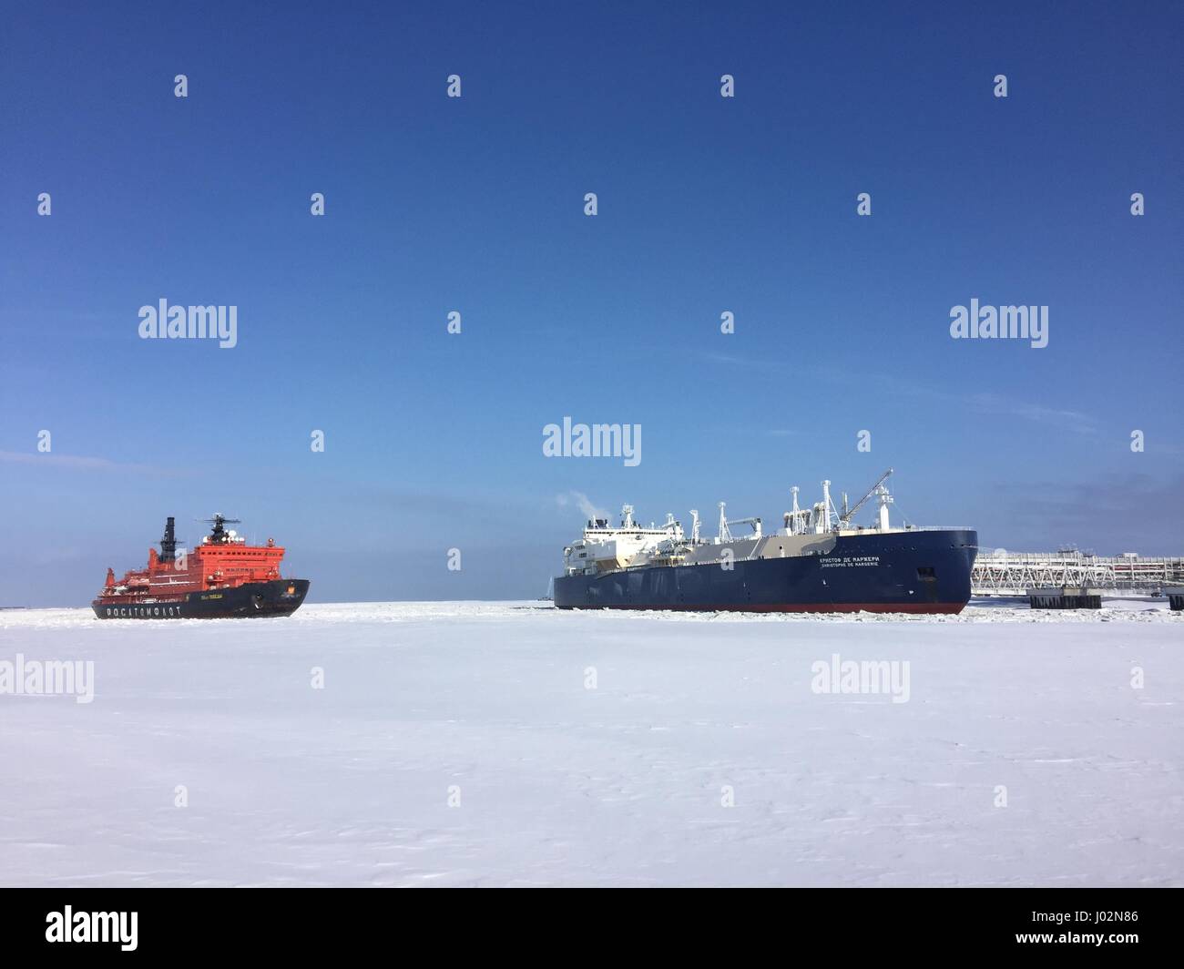 Sabetta, Russia. 30th Mar, 2017. The Christophe de Margerie (R), a gas ...