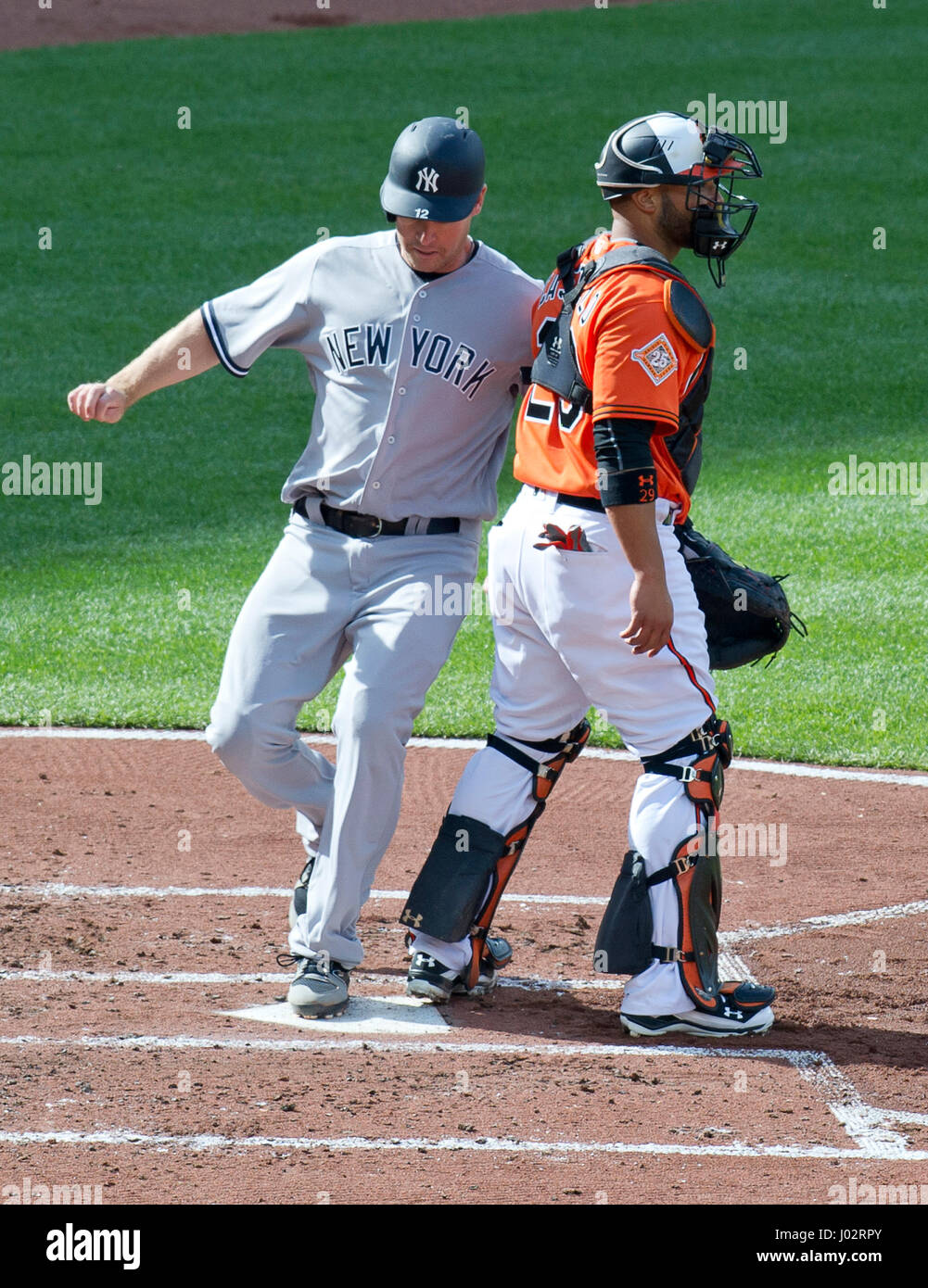 New York Yankees third baseman Chase Headley (12) scores the Yankees ...