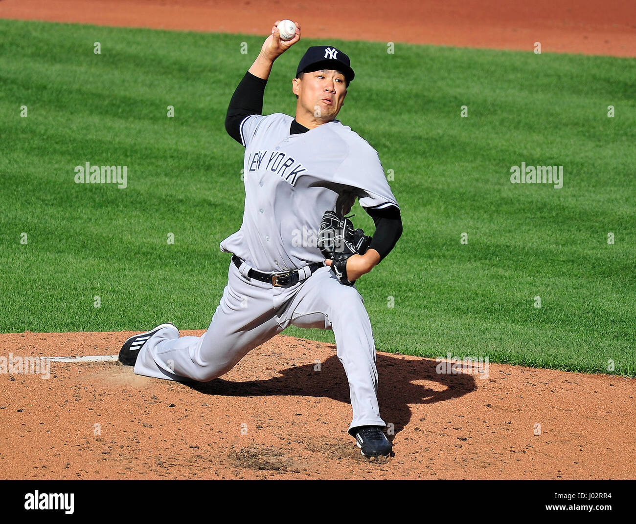 New York Yankees starting pitcher Masahiro Tanaka (19) pitches in the ...