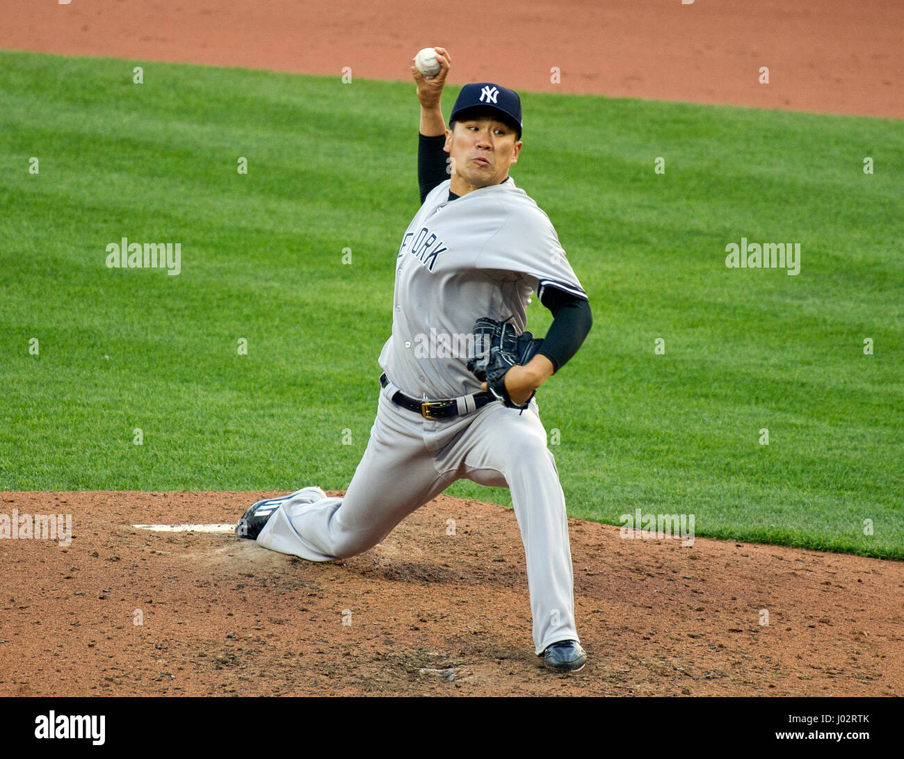 New York Yankees starting pitcher Masahiro Tanaka (19) pitches in the ...