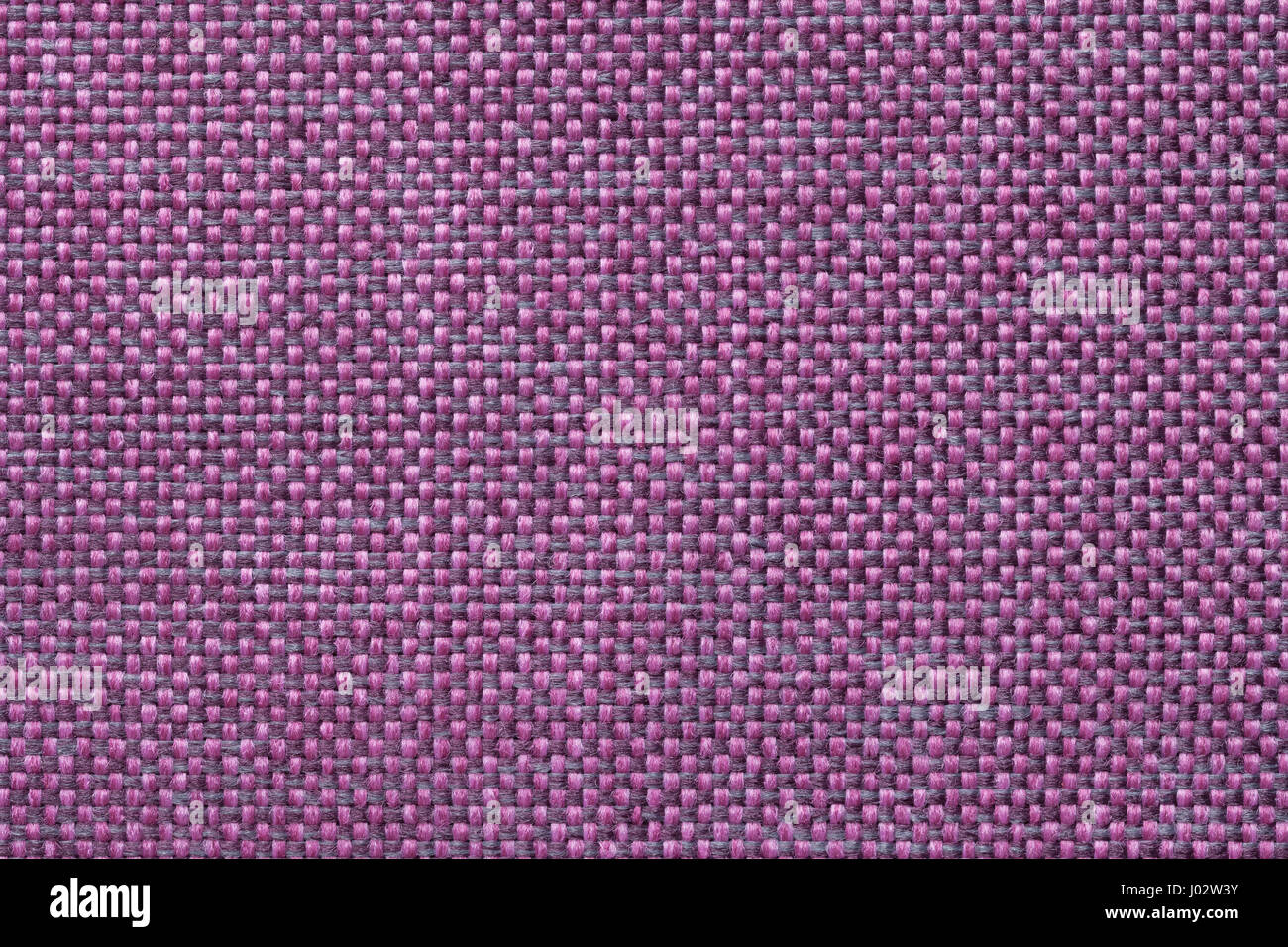 Dark violet background with checkered pattern, closeup. Structure of ...