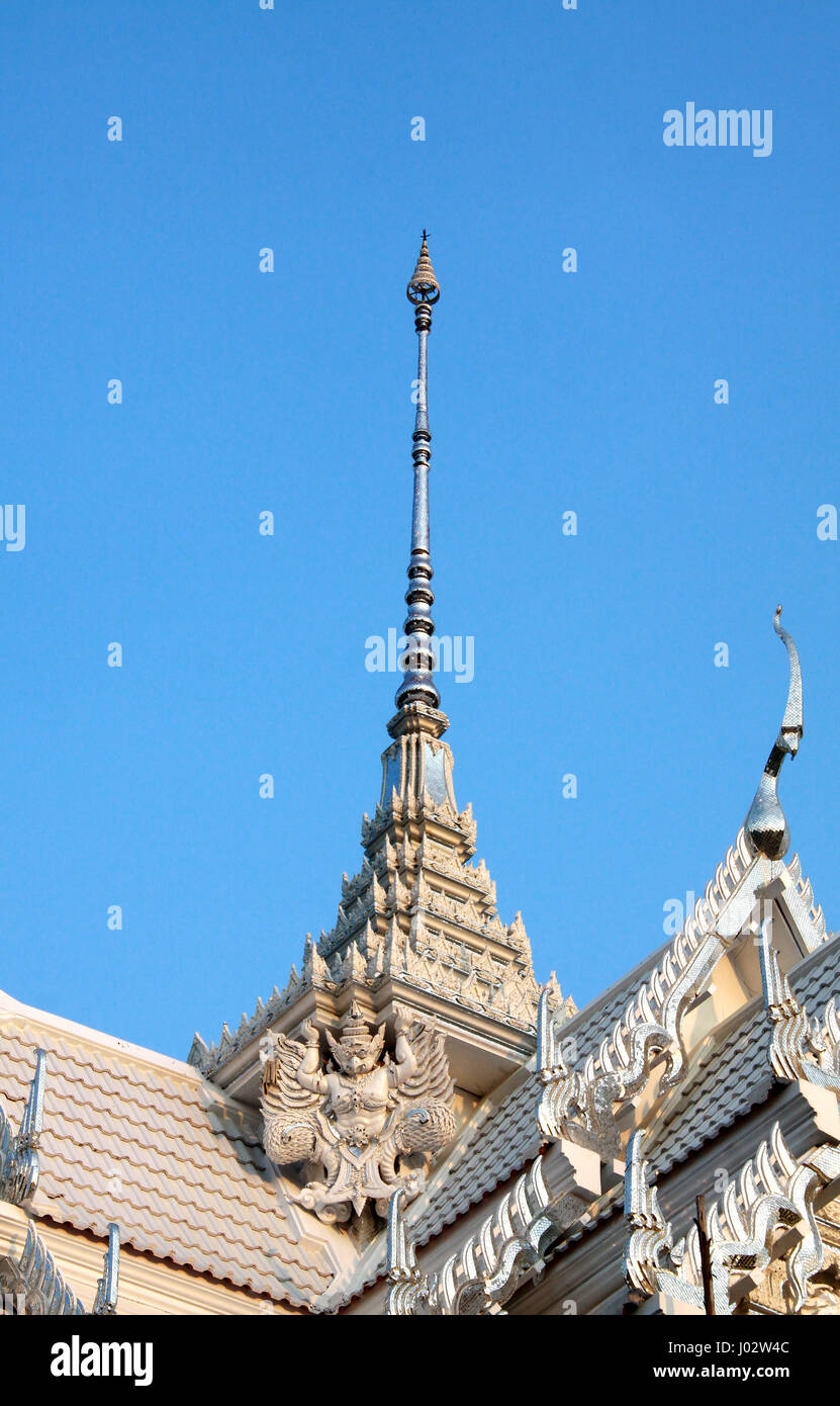 beautiful pinnacle of Thai temple with blue sky Stock Photo - Alamy