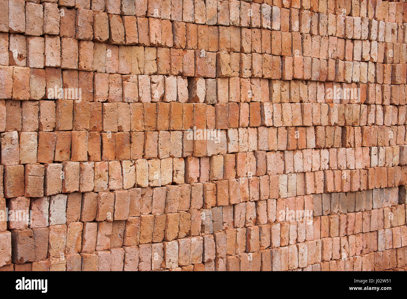 big stack of red clay block for wall construction, texture Stock Photo ...