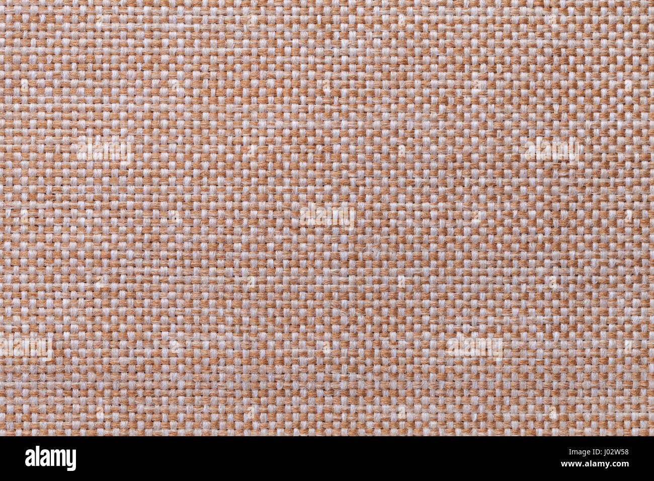 Light brown textile background closeup. Structure of the fabric macro ...