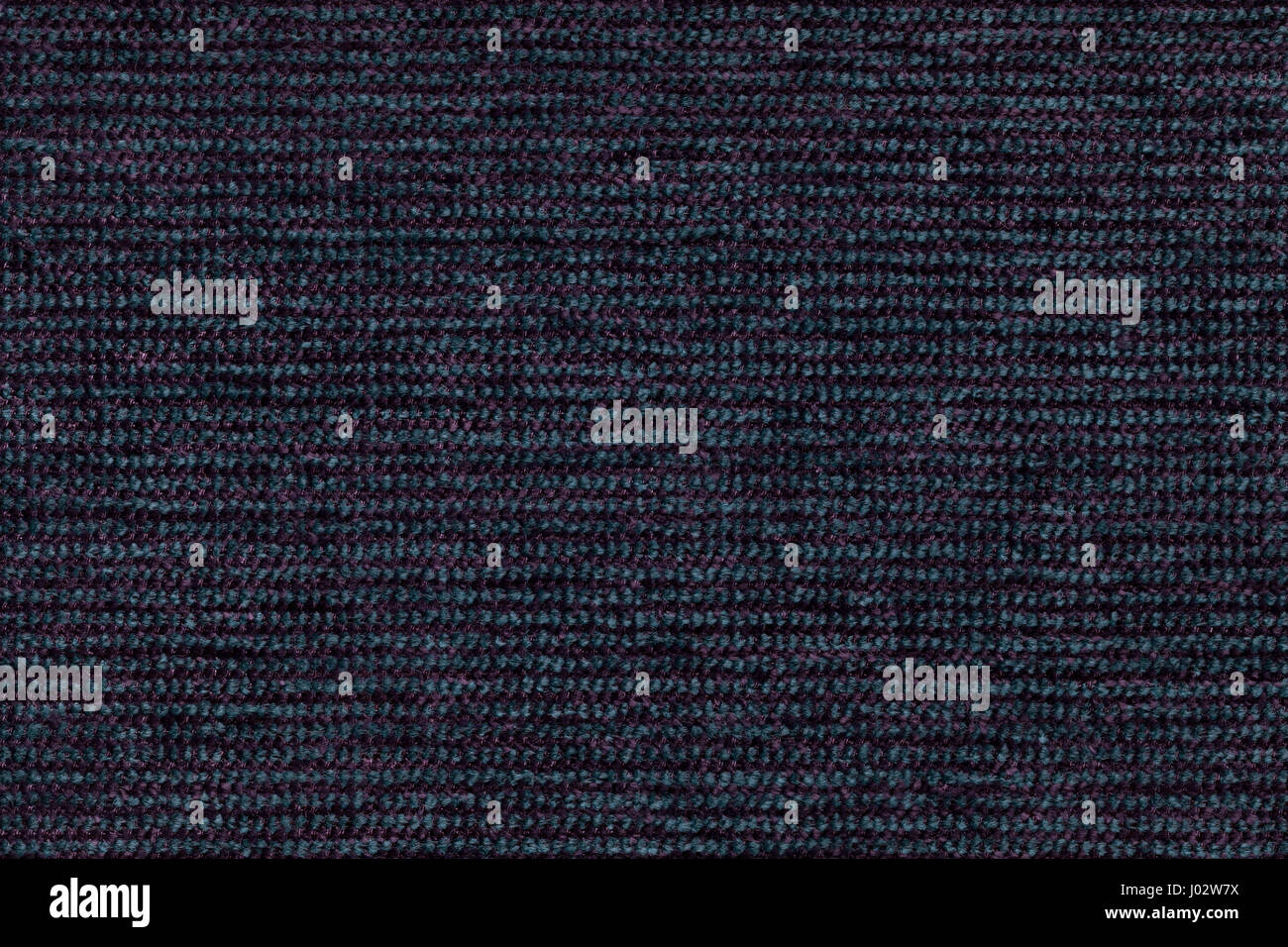 Navy blue background with checkered pattern, closeup. Structure of the ...