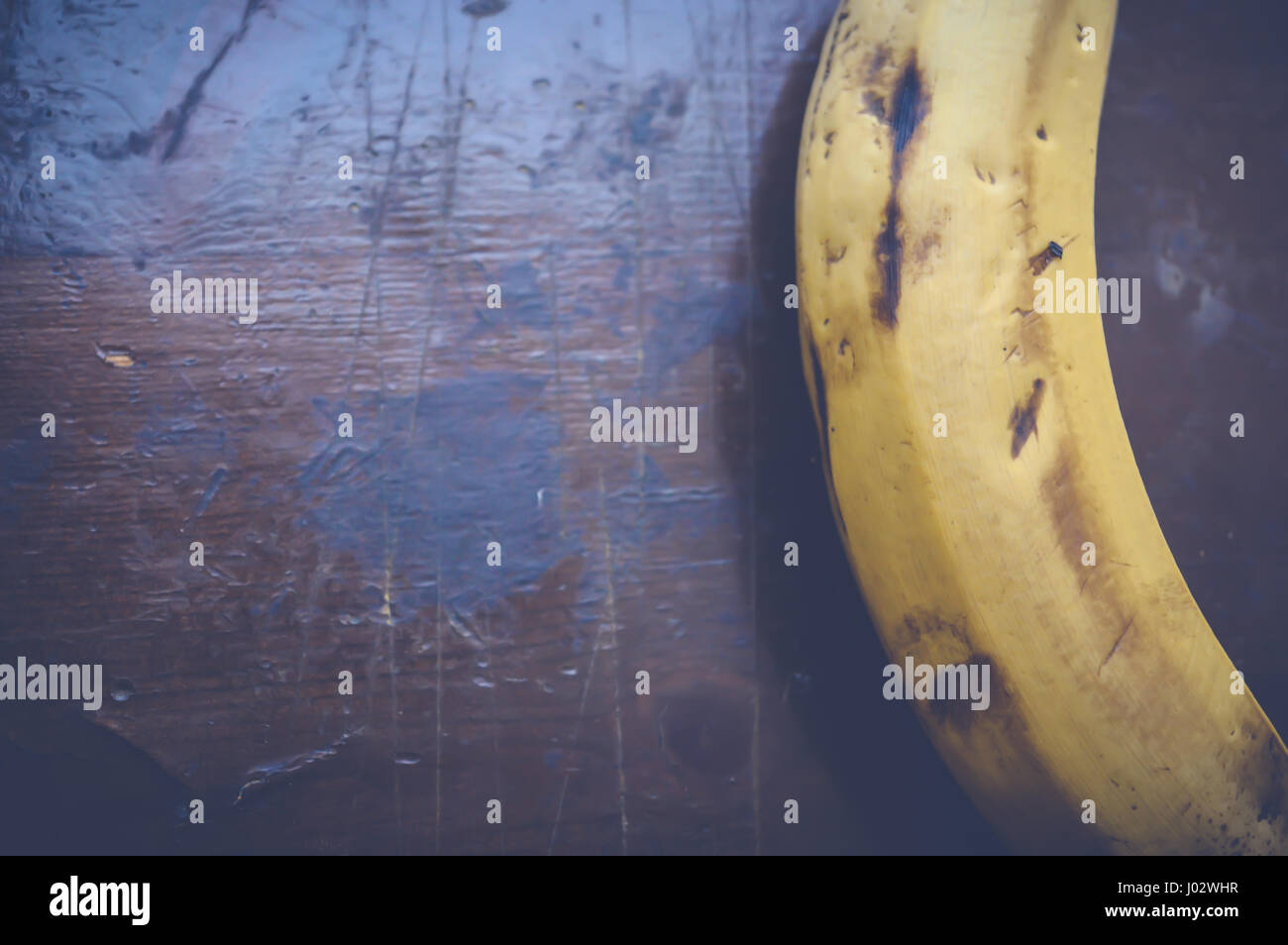banana on wooden table Stock Photo - Alamy