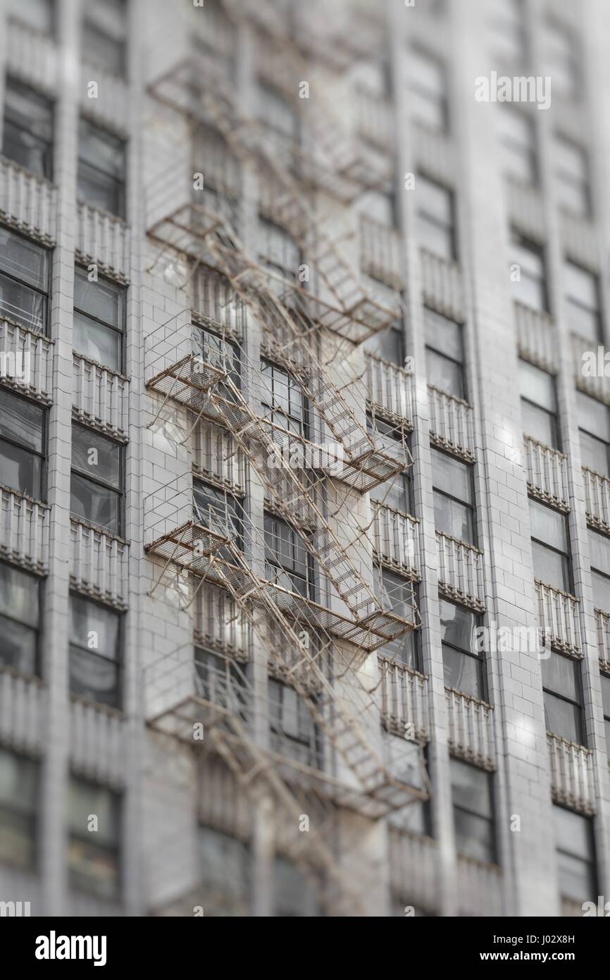 Metal fire escape outside apartment building for emergency Stock Photo ...