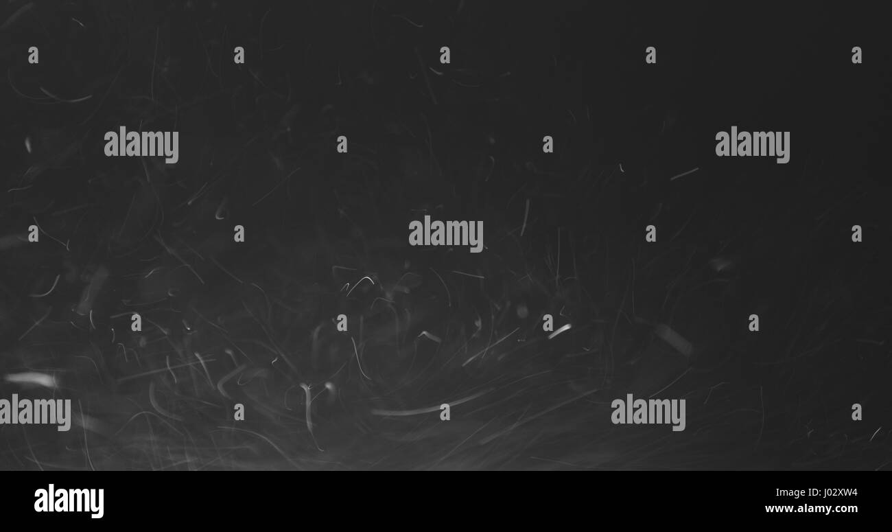 dust particles fast moving over black background from left, 4k photo ...