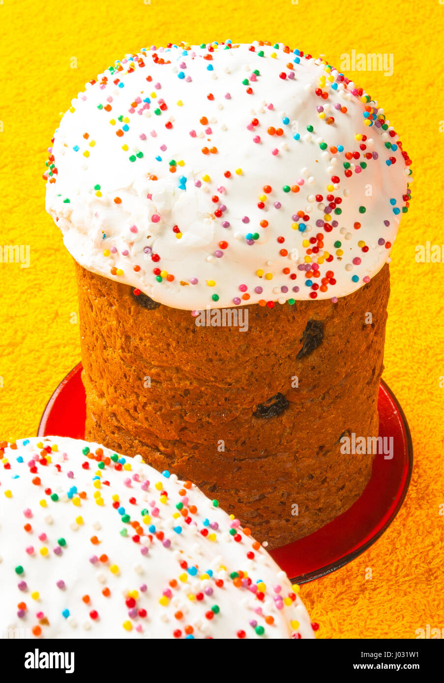 Kulichi, traditional Russian Easter cake with icing and dyed eggs Stock ...