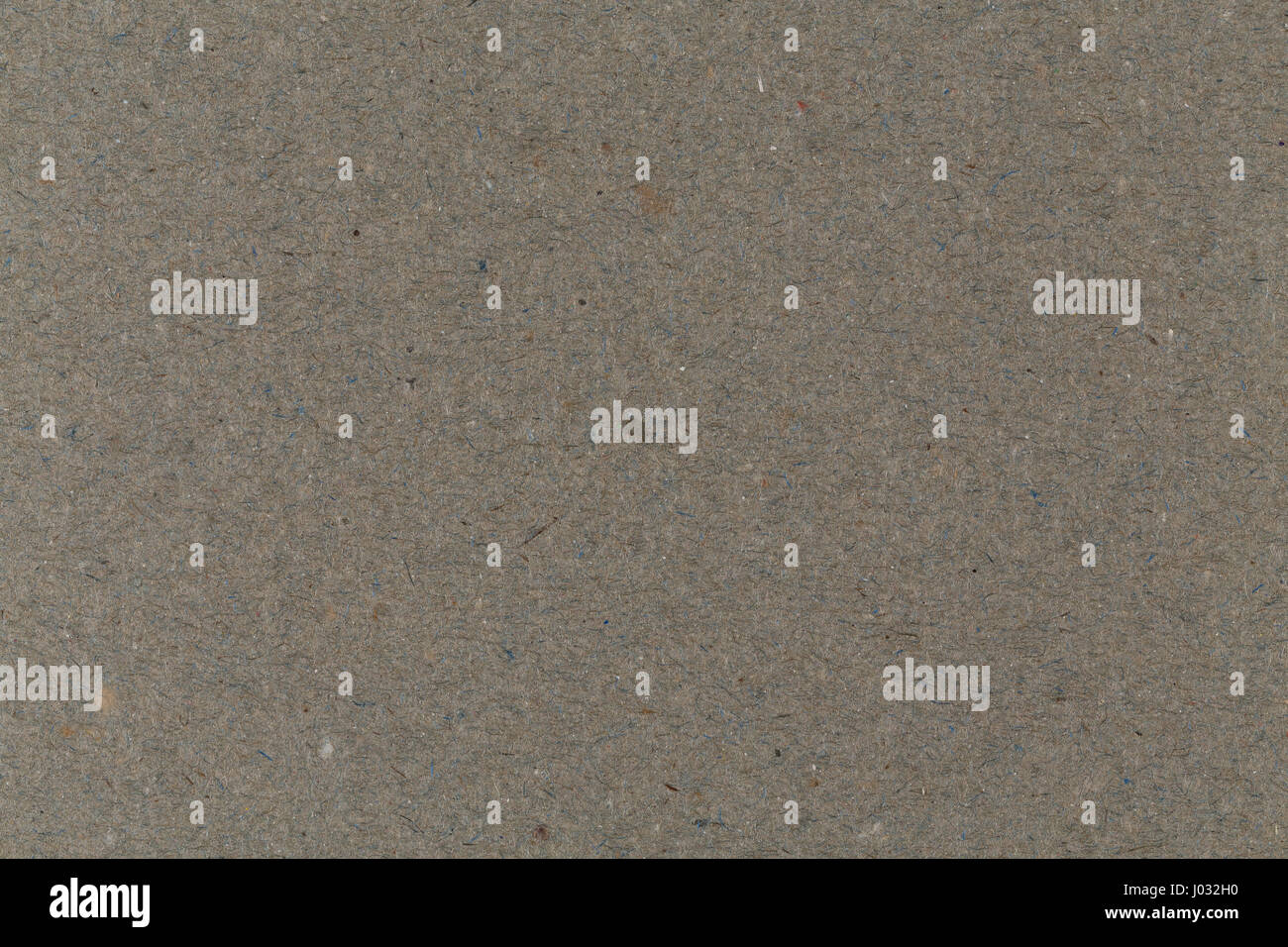 Dense cardboard paper closeup texture or background Stock Photo - Alamy