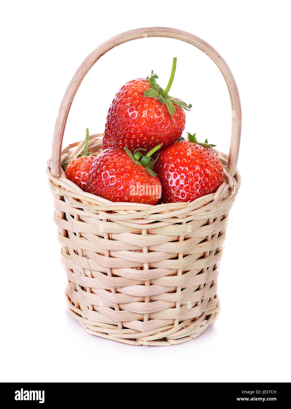Strawberries in a basket isolated on white background Stock Photo - Alamy