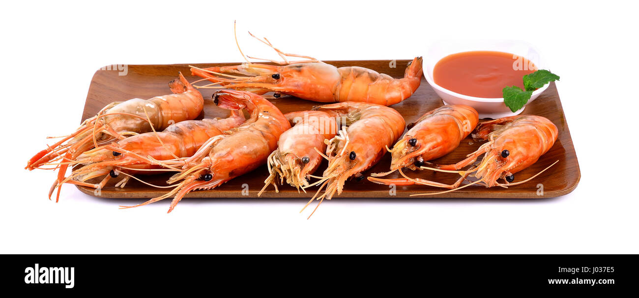 Raw shrimps on wooden Cut Out Stock Images & Pictures - Alamy