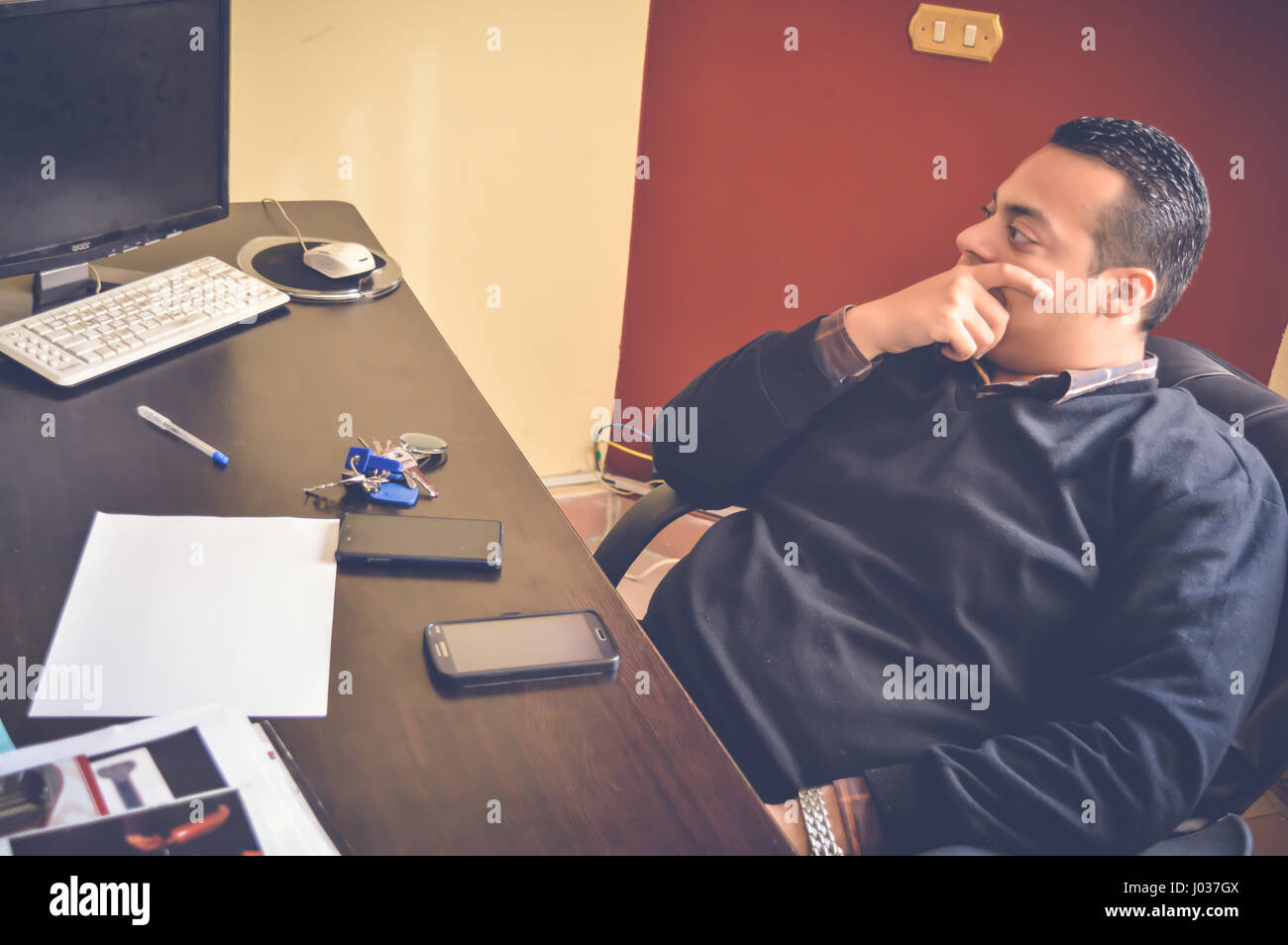 young business man thinking about work Stock Photo - Alamy