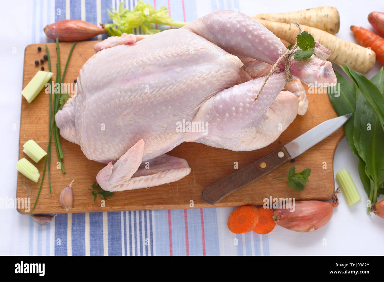 Whole raw chicken Stock Photo - Alamy