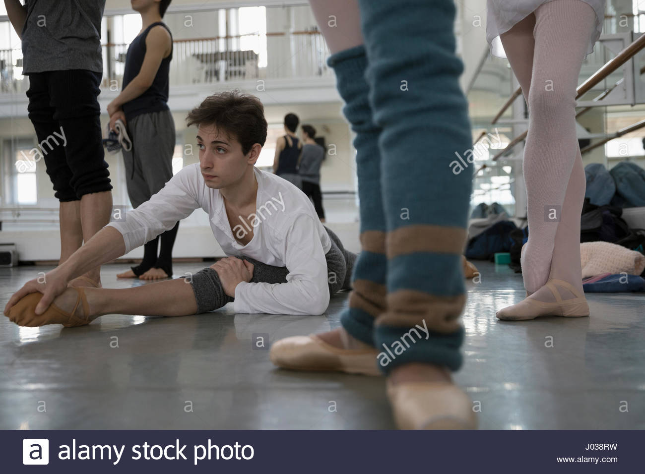 Male ballet dancer stretching warming hi-res stock photography and ...
