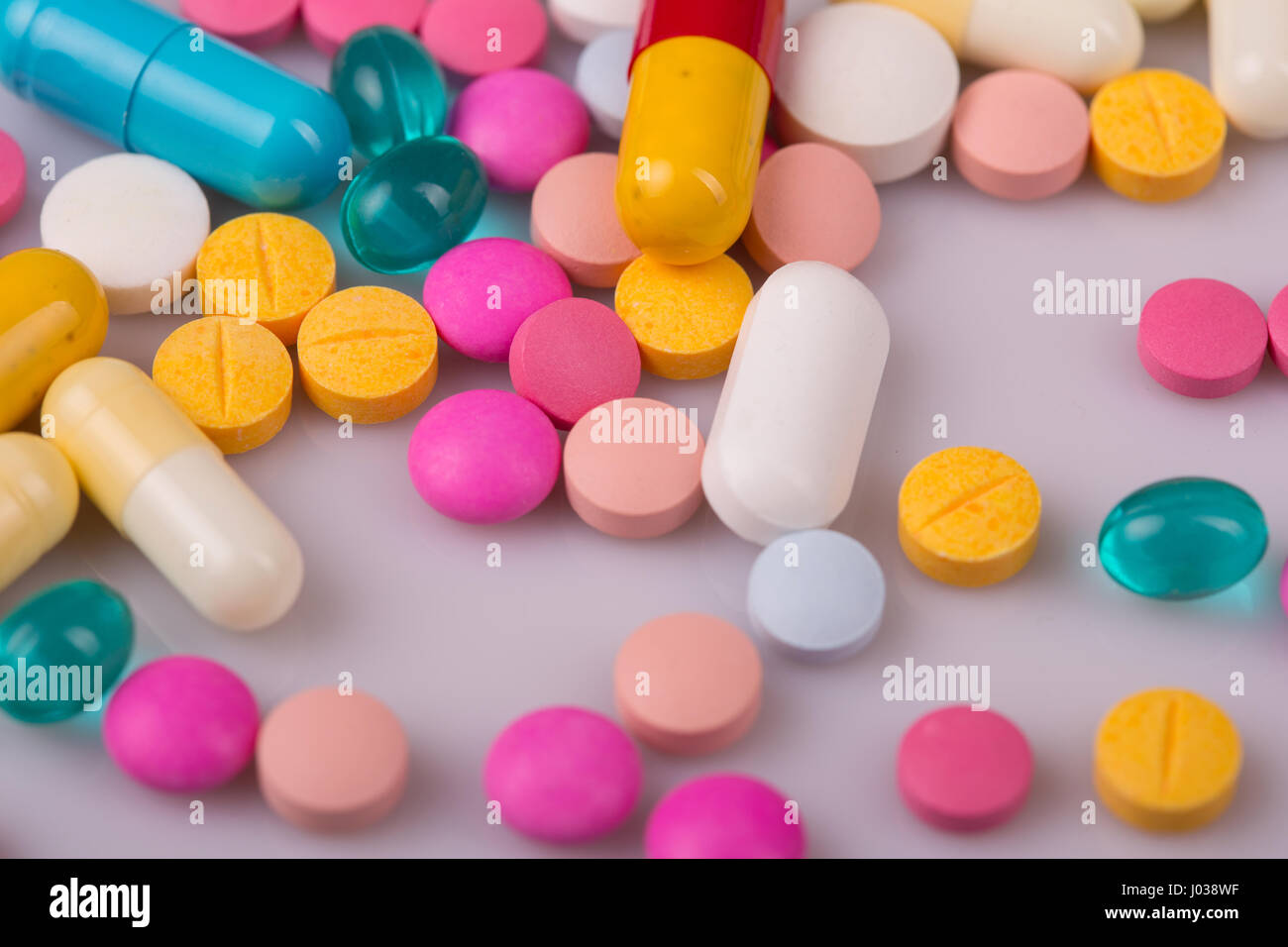different Tablets pills capsule heap mix therapy drugs Stock Photo - Alamy