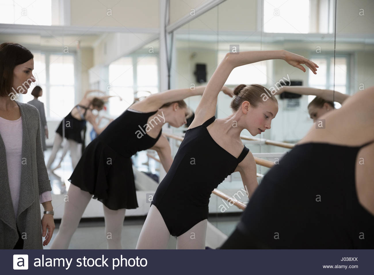 Dancer watching in mirror hi-res stock photography and images - Alamy
