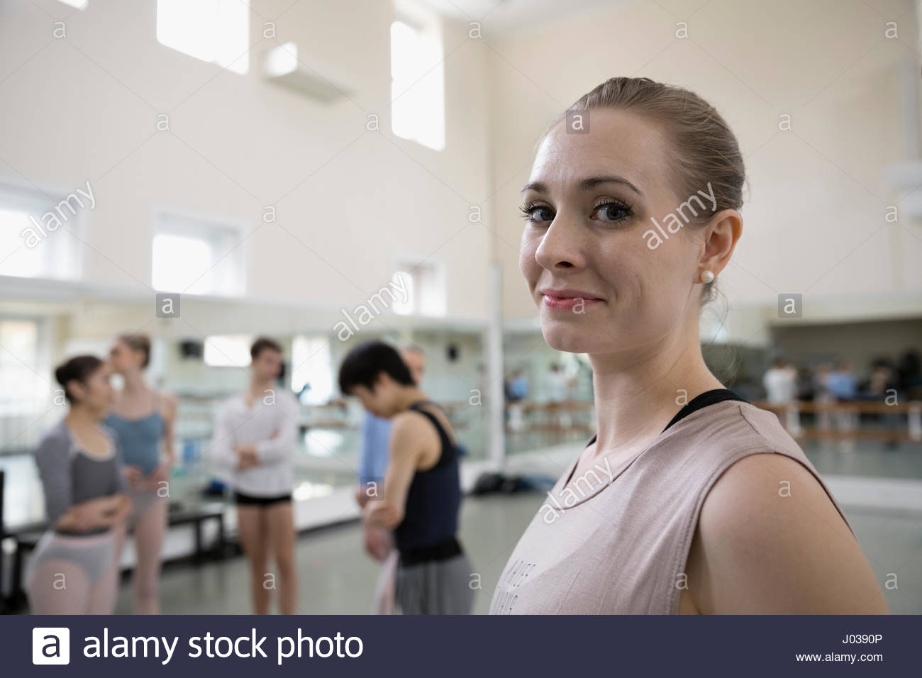 Portrait confident female ballet dancer in dance studio Stock Photo - Alamy