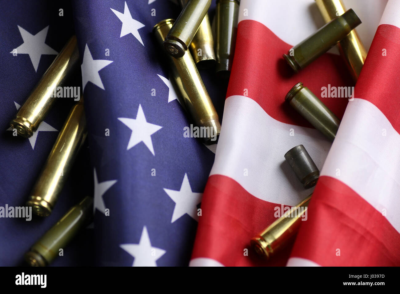 bullet on the USA flag Stock Photo - Alamy