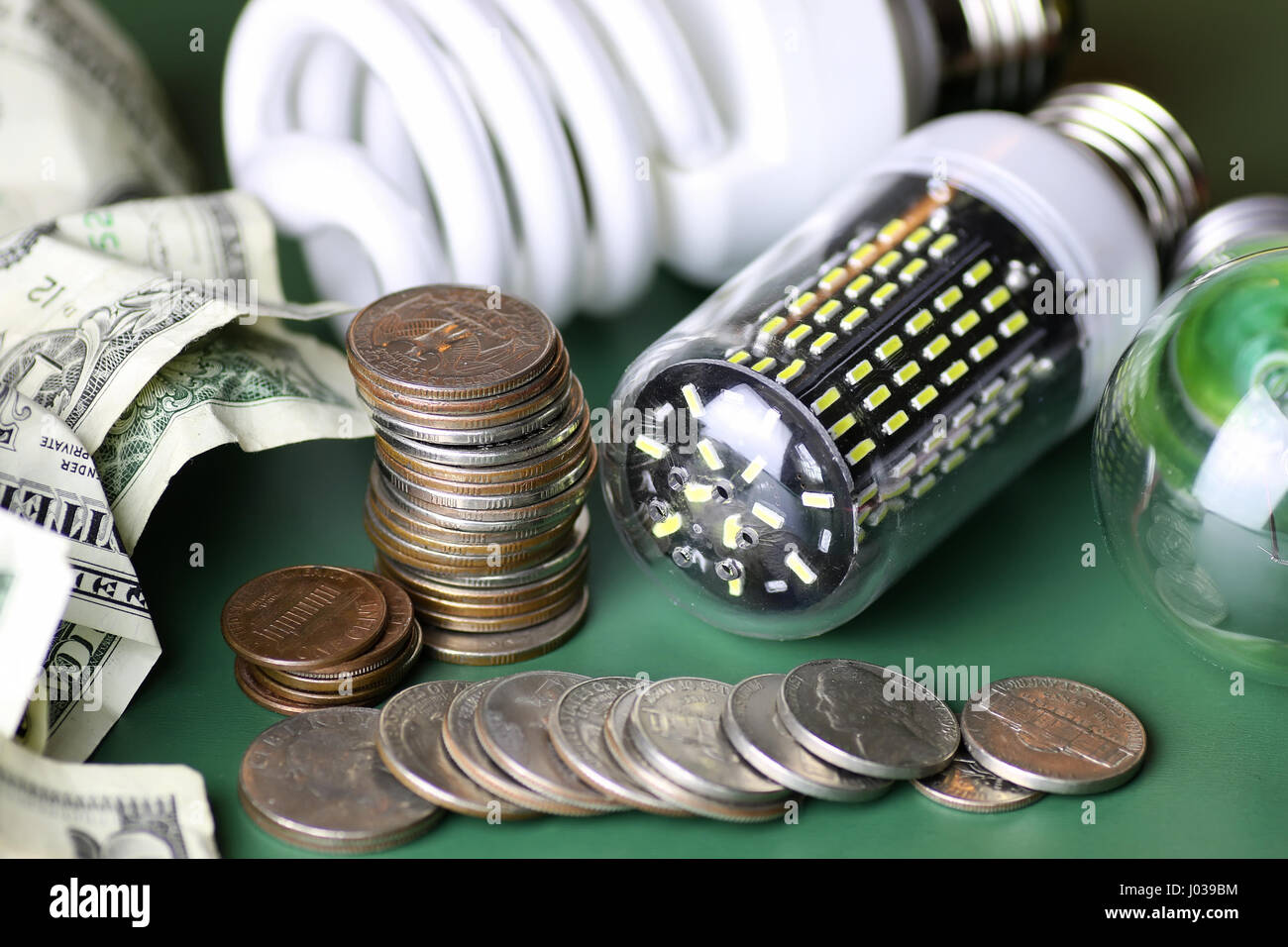 different lamps and money Stock Photo - Alamy