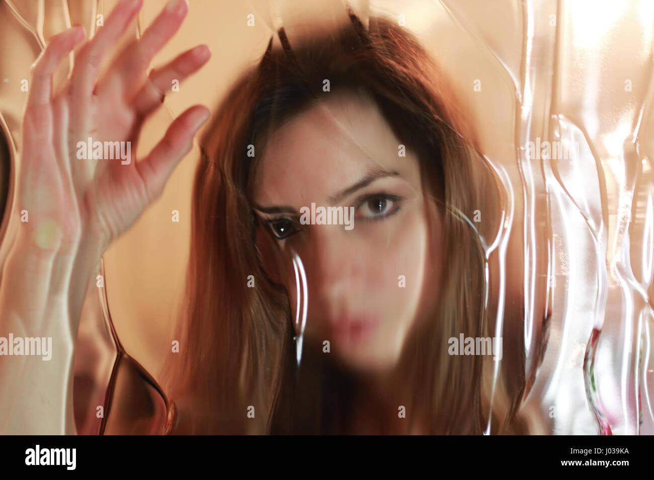 girl face behind glass Stock Photo - Alamy