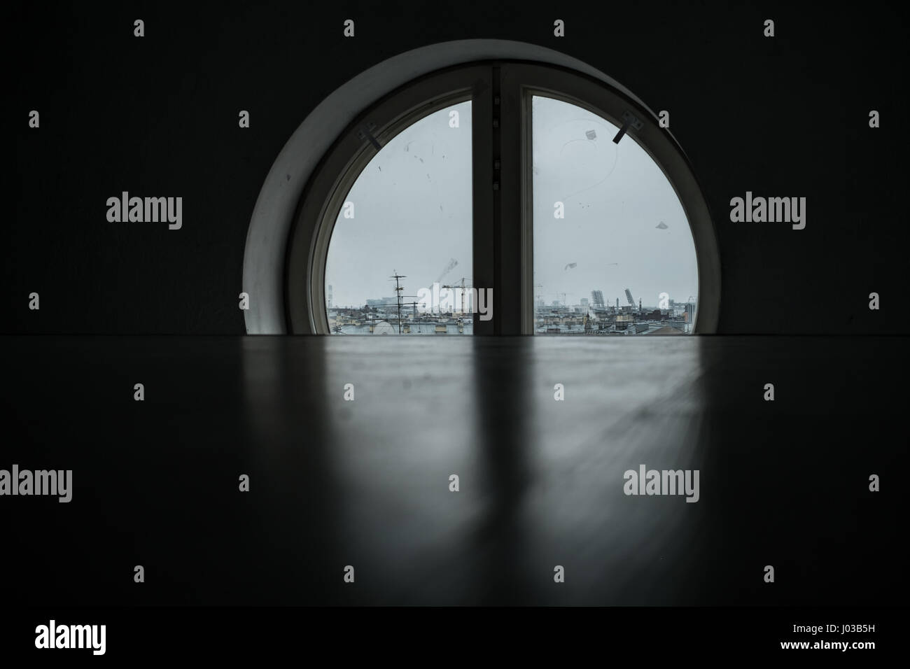 Urban view from the round window in Saint-Petersburg Stock Photo - Alamy