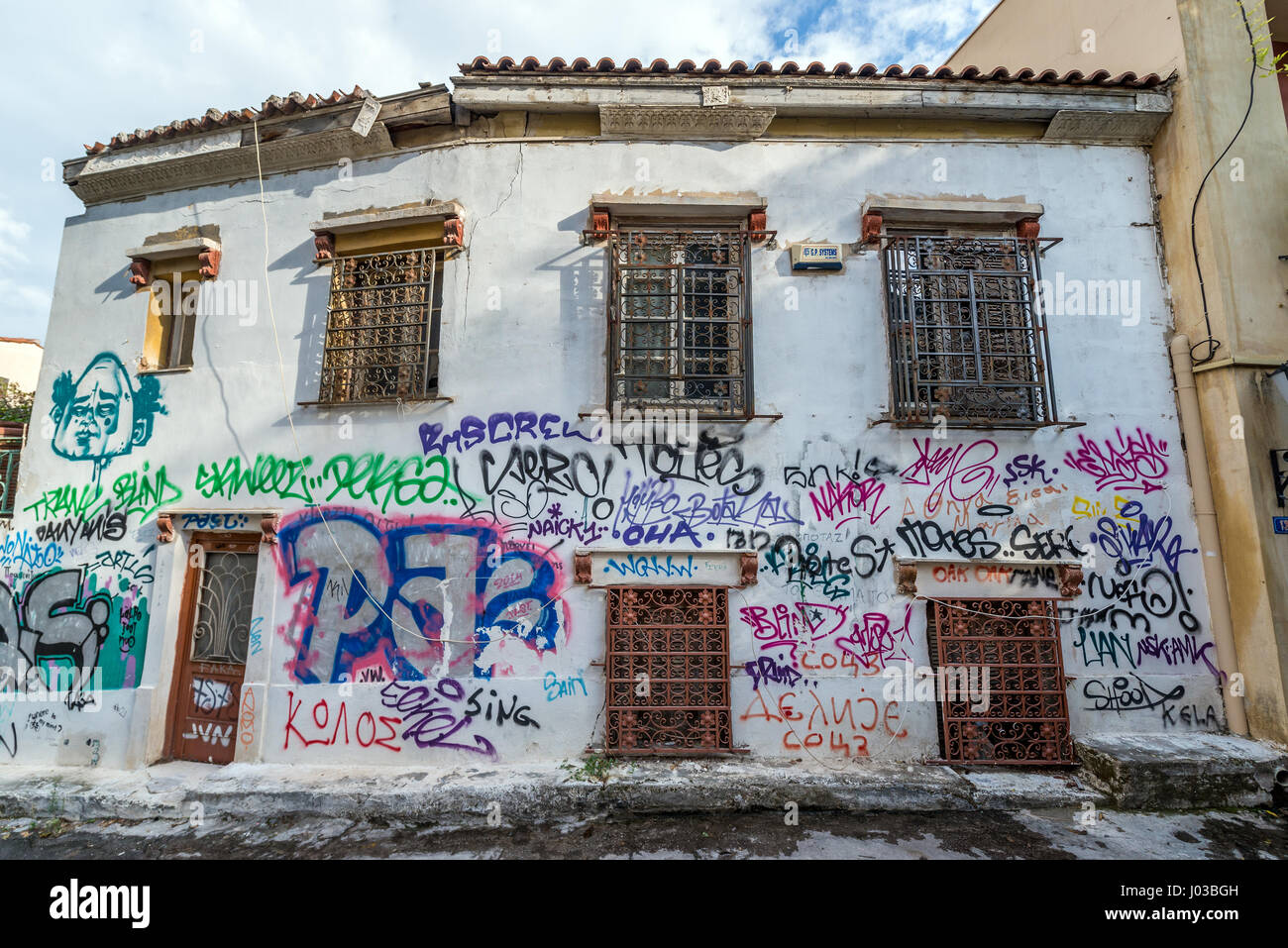 Graffiti on the wall in Plaka historical neighborhood in Athens city ...