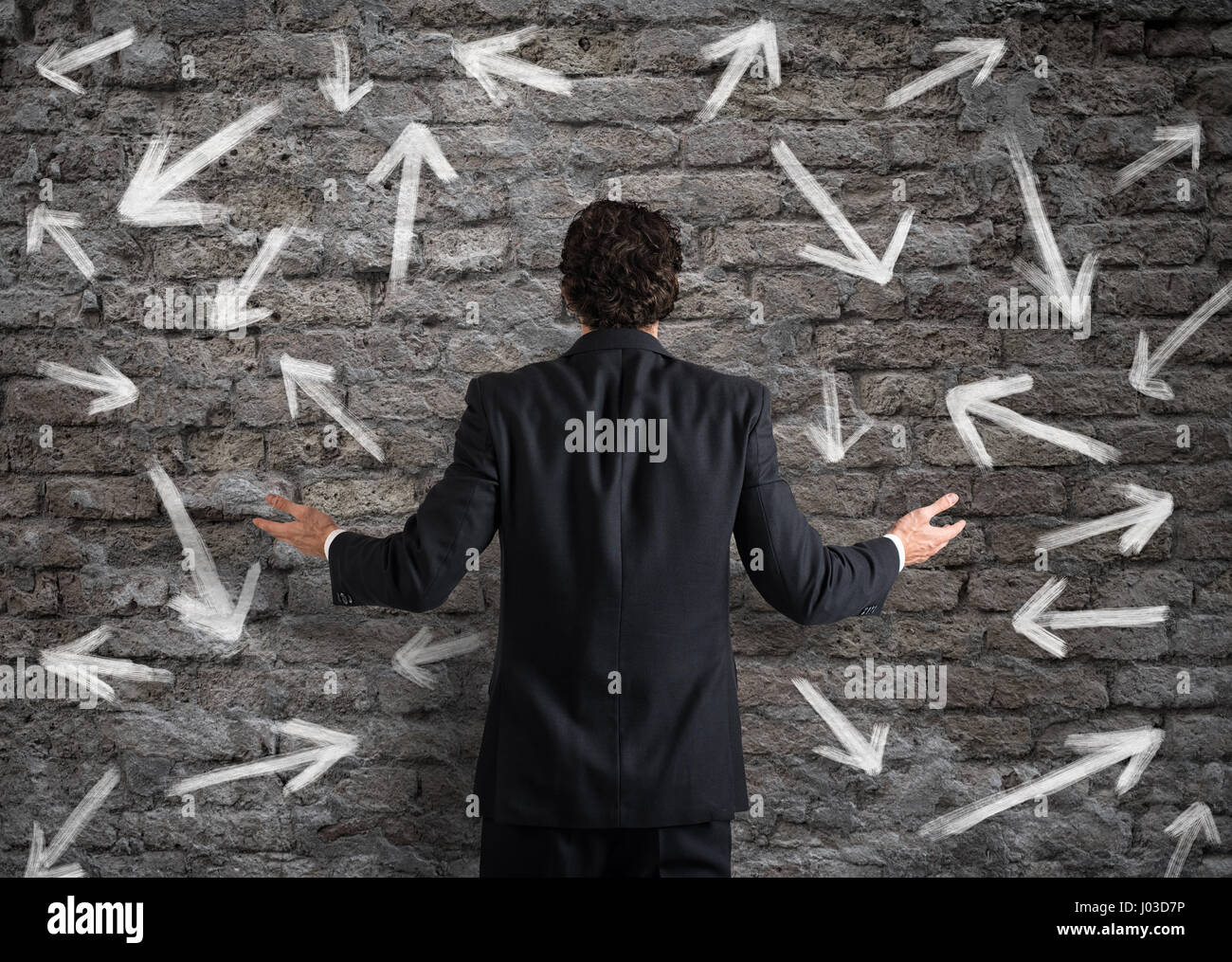 Difficult choices of a businessman Stock Photo - Alamy