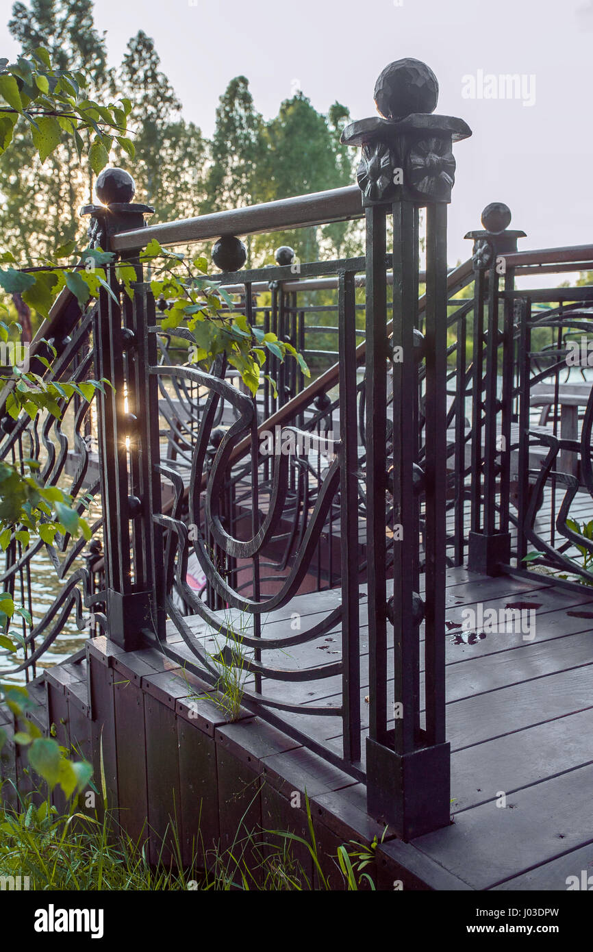 details of metal forged fence Stock Photo - Alamy