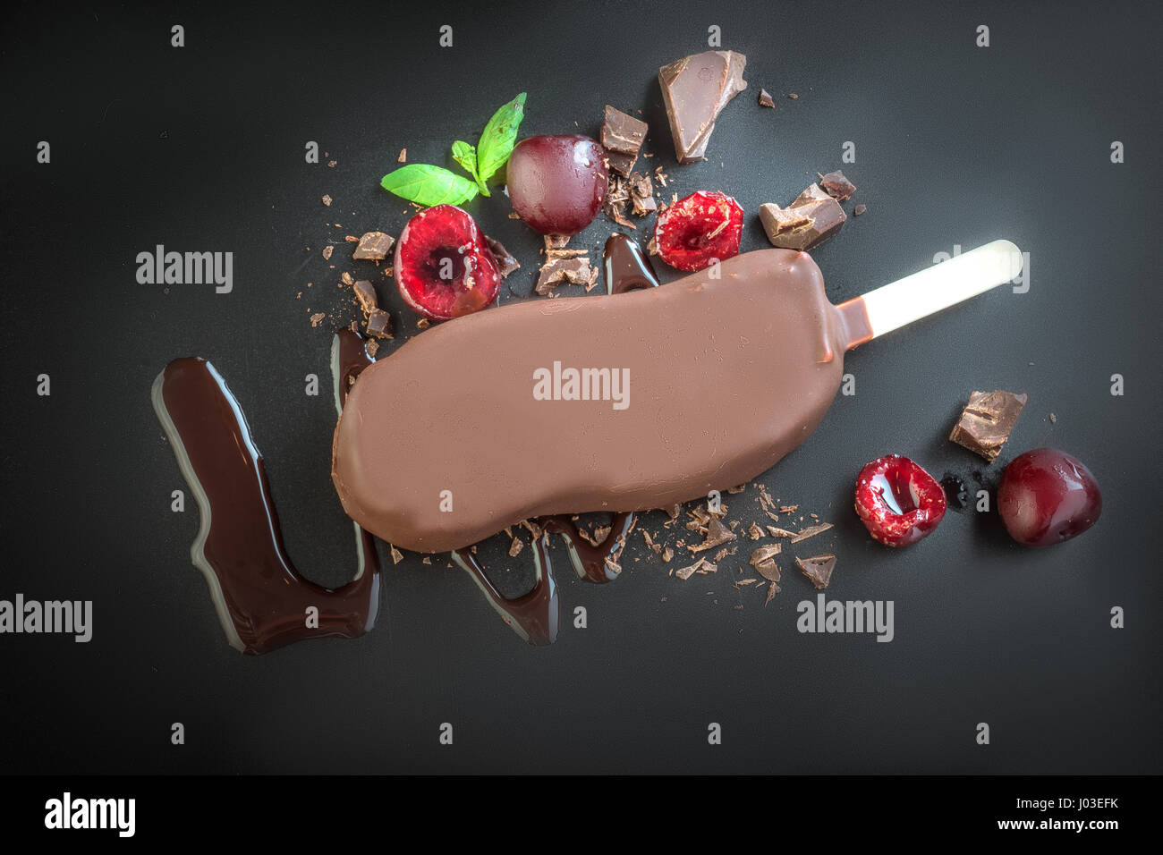tasty ice cream in milk chocolate Stock Photo - Alamy
