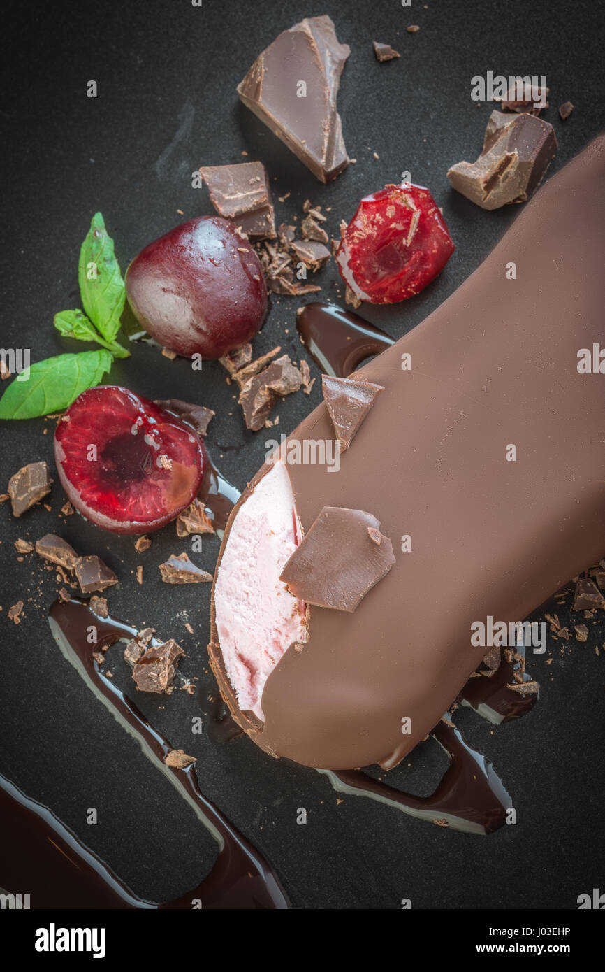 tasty ice cream in milk chocolate Stock Photo - Alamy