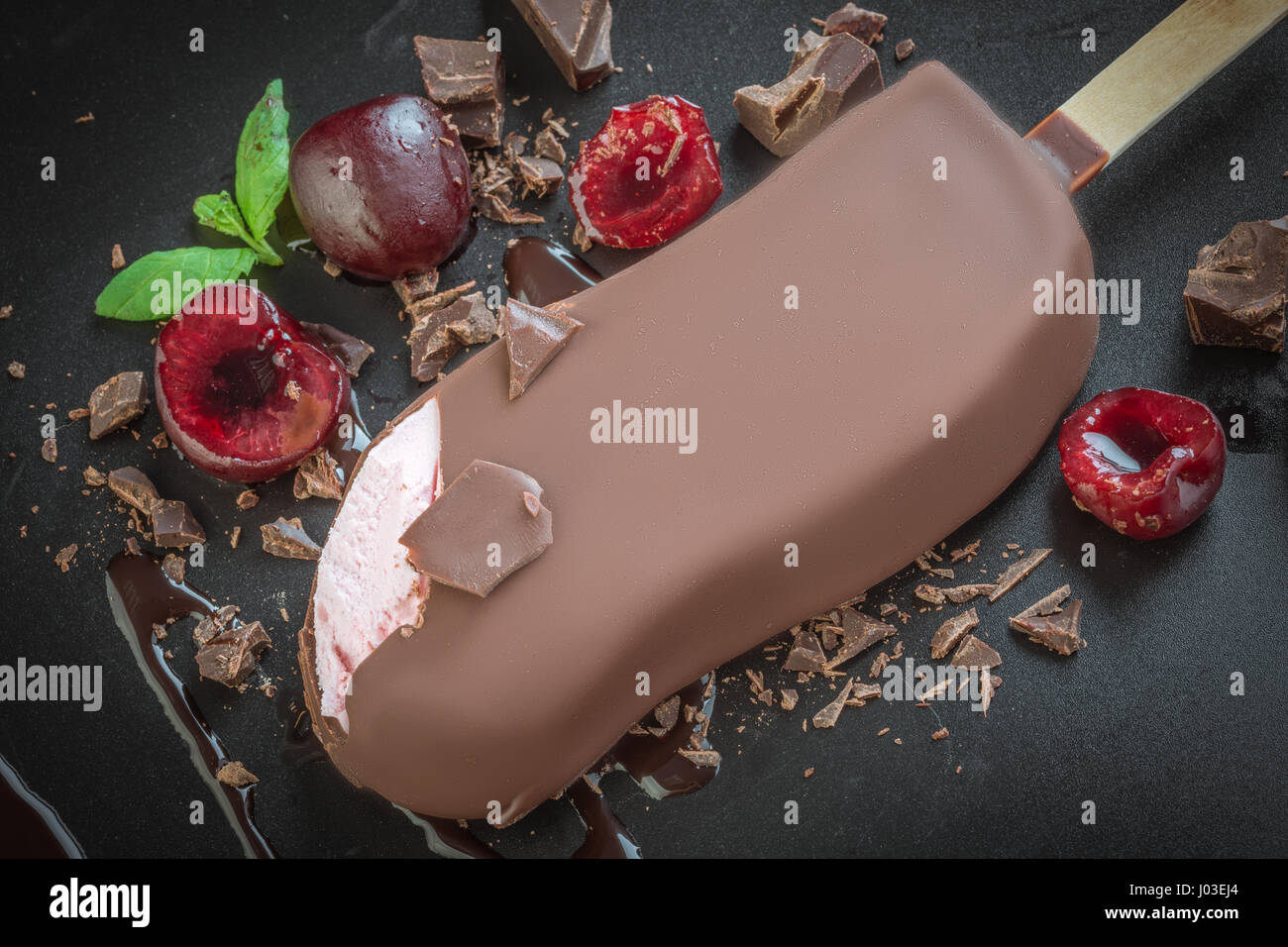 tasty ice cream in milk chocolate Stock Photo - Alamy