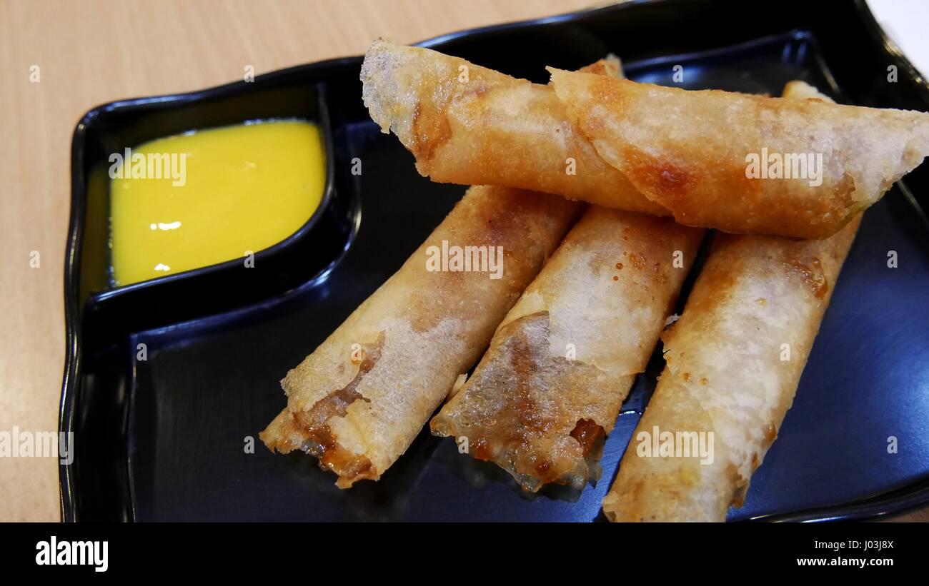 Turon. Banana fritters with jackfruit and dipped in cheese Filipino ...